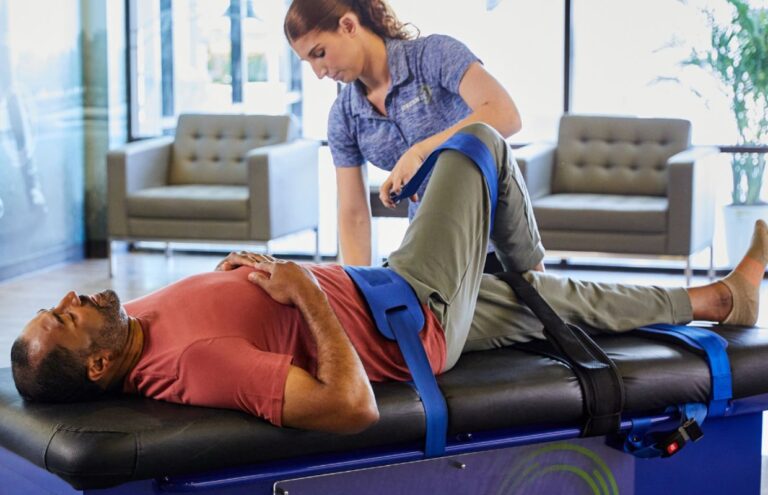 Relieving Back Discomfort Through Assisted Stretching | Stretch Zone